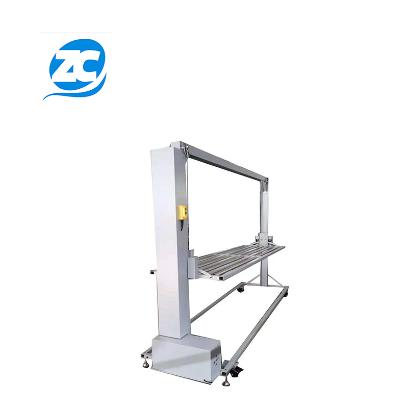 Fabric lift machine for spreading fabric machine